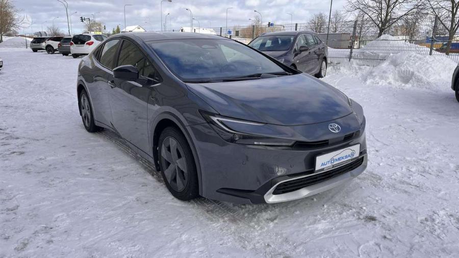 Grey Toyota Prius 2023 in Klaipeda, with an engine capacity of 2.00 L and mileage of 13 thousand km for 29800 €, photo 1 on AUTOMOTO.COM.LV