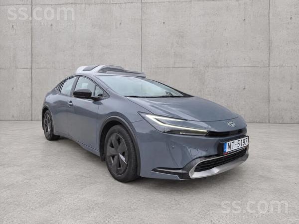 Grey Toyota Prius 2024 in Riga, with an engine capacity of 2.00 L and mileage of 50 thousand km for 30400 €, photo 3 on AUTOMOTO.COM.LV
