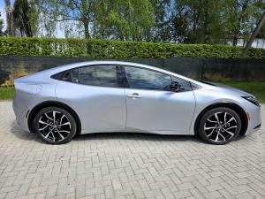 Grey Toyota Prius 2025 in Vilnius, with an engine capacity of 1.99 L and mileage of 7 thousand km for 31890 €, photo 6 on AUTOMOTO.COM.LV