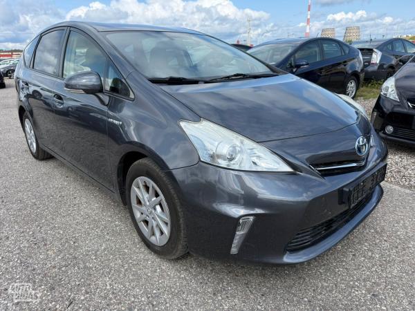 Grey Toyota Prius 2012 in Vilnius, with an engine capacity of 1.80 L and mileage of 248 thousand km for 12800 €, photo 2 on AUTOMOTO.COM.LV