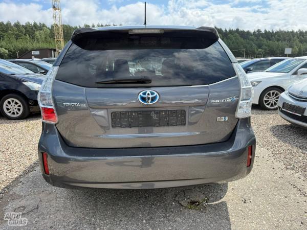Grey Toyota Prius 2012 in Vilnius, with an engine capacity of 1.80 L and mileage of 248 thousand km for 12800 €, photo 3 on AUTOMOTO.COM.LV