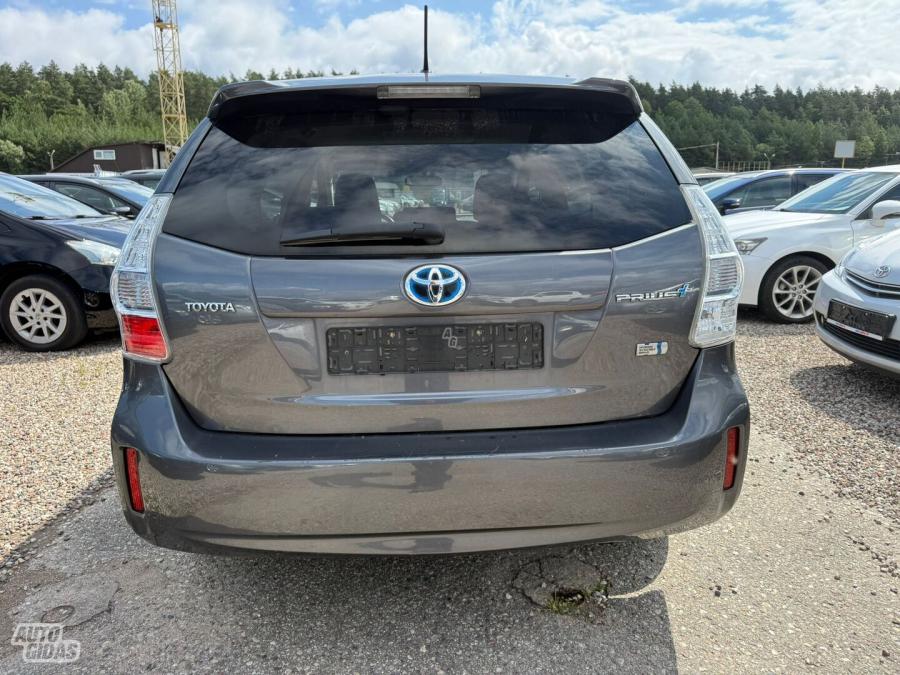 Grey Toyota Prius 2012 in Vilnius, with an engine capacity of 1.80 L and mileage of 248 thousand km for 12800 €, photo 4 on AUTOMOTO.COM.LV