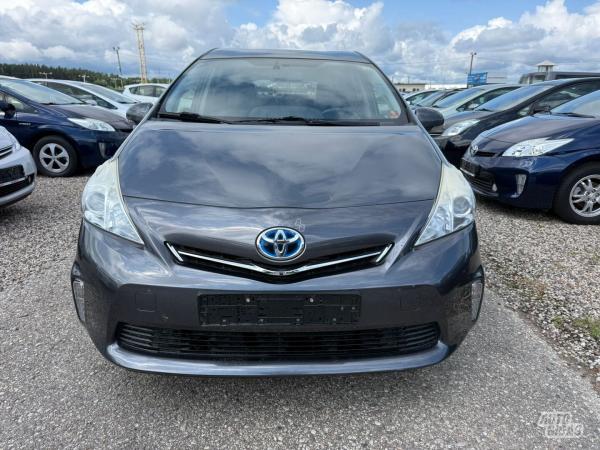 Grey Toyota Prius 2012 in Vilnius, with an engine capacity of 1.80 L and mileage of 248 thousand km for 12800 €, photo 4 on AUTOMOTO.COM.LV