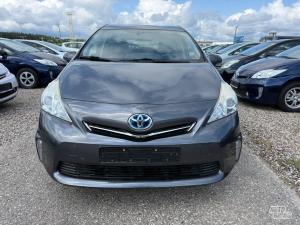 Grey Toyota Prius 2012 in Vilnius, with an engine capacity of 1.80 L and mileage of 248 thousand km for 12800 €, photo 5 on AUTOMOTO.COM.LV