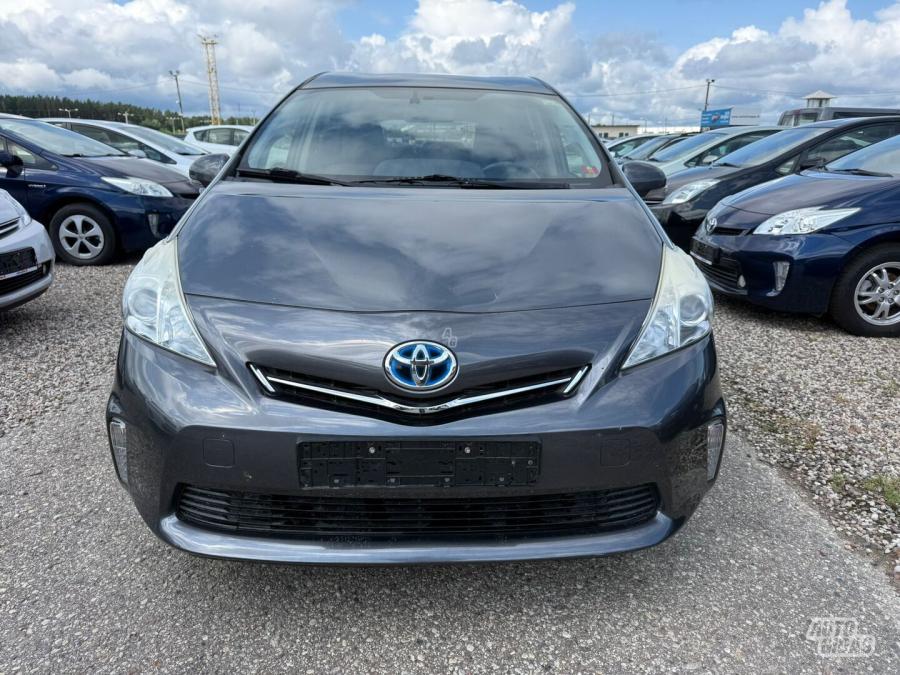 Grey Toyota Prius 2012 in Vilnius, with an engine capacity of 1.80 L and mileage of 248 thousand km for 12800 €, photo 5 on AUTOMOTO.COM.LV