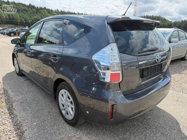 Grey Toyota Prius 2012 in Vilnius, with an engine capacity of 1.80 L and mileage of 248 thousand km for 12800 €, photo 5 on AUTOMOTO.COM.LV