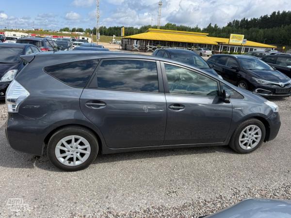 Grey Toyota Prius 2012 in Vilnius, with an engine capacity of 1.80 L and mileage of 248 thousand km for 12800 €, photo 7 on AUTOMOTO.COM.LV