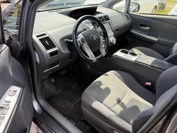 Grey Toyota Prius 2012 in Vilnius, with an engine capacity of 1.80 L and mileage of 248 thousand km for 12800 €, photo 10 on AUTOMOTO.COM.LV