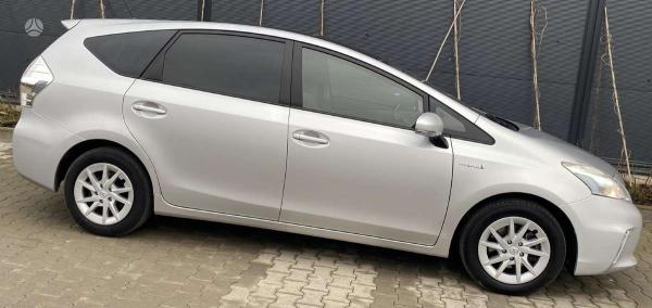 Pelēks Toyota Prius 2013 Viļņa, ar dzinēja tilpumu 1.80 L un nobraukumu 215 tūkst. km par 9950 €, foto 9 vietnē AUTOMOTO.COM.LV