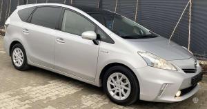 Grey Toyota Prius 2013 in Vilnius, with an engine capacity of 1.80 L and mileage of 215 thousand km for 9950 €, photo 10 on AUTOMOTO.COM.LV