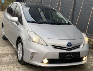 Grey Toyota Prius 2013 in Vilnius, with an engine capacity of 1.80 L and mileage of 215 thousand km for 9950 €, photo 11 on AUTOMOTO.COM.LV