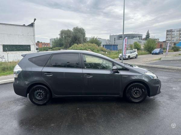 Grey Toyota Prius 2013 in Siauliai, with an engine capacity of 1.80 L and mileage of 258 thousand km for 8250 €, photo 4 on AUTOMOTO.COM.LV
