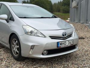 Grey Toyota Prius 2014 in Vilnius, with an engine capacity of 1.80 L and mileage of 444 thousand km for 7300 €, photo 15 on AUTOMOTO.COM.LV