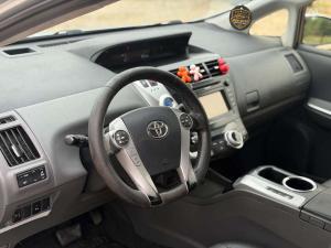Grey Toyota Prius 2014 in Vilnius, with an engine capacity of 1.80 L and mileage of 444 thousand km for 7300 €, photo 16 on AUTOMOTO.COM.LV