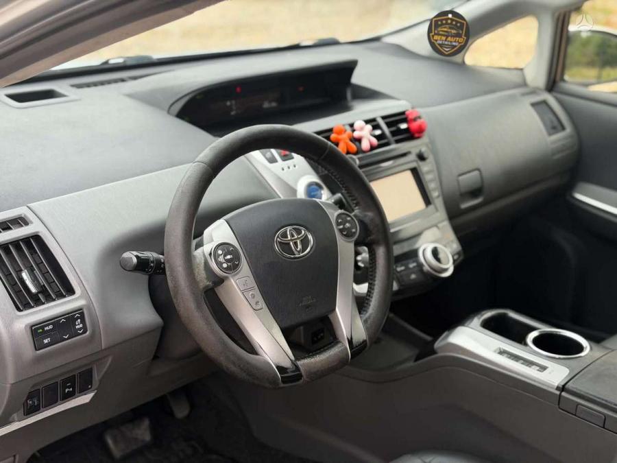 Grey Toyota Prius 2014 in Vilnius, with an engine capacity of 1.80 L and mileage of 444 thousand km for 7300 €, photo 16 on AUTOMOTO.COM.LV