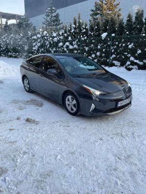 Grey Toyota Prius 2016 in Klaipeda, with an engine capacity of 1.80 L and mileage of 115 thousand km for 12900 €, photo  on AUTOMOTO.COM.LV