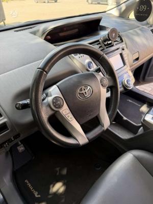 Pelēks Toyota Prius 2012 Viļņa, ar dzinēja tilpumu 1.80 L un nobraukumu 210 tūkst. km par 9500 €, foto 14 vietnē AUTOMOTO.COM.LV