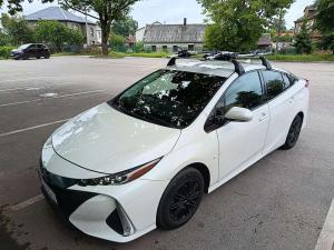 White Toyota Prius Prime 2017 in Kaunas, with an engine capacity of 1.80 L and mileage of 170 thousand km for 12500 €, photo  on AUTOMOTO.COM.LV