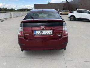 Sarkans Toyota Prius 2005 Viļņa, ar dzinēja tilpumu 1.50 L un nobraukumu 299 tūkst. km par 1500 €, foto 8 vietnē AUTOMOTO.COM.LV
