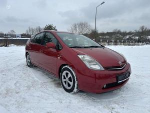 Sarkans Toyota Prius 2006 Alīta, ar dzinēja tilpumu 1.50 L un nobraukumu 279 tūkst. km par 4250 €, foto  vietnē AUTOMOTO.COM.LV