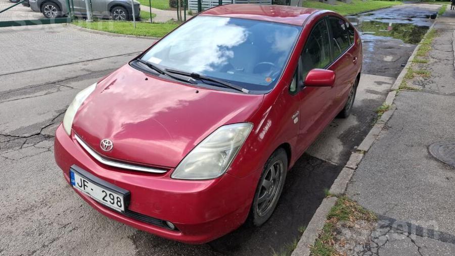 Sarkans Toyota Prius 2006 Rīga, ar dzinēja tilpumu 1.50 L un nobraukumu 254 tūkst. km par 1999 €, foto 1 vietnē AUTOMOTO.COM.LV