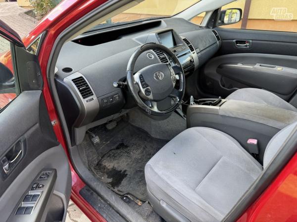 Sarkans Toyota Prius 2007 Kauņa, ar dzinēja tilpumu 1.50 L un nobraukumu 358 tūkst. km par 1400 €, foto 8 vietnē AUTOMOTO.COM.LV