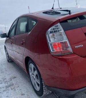 Red Toyota Prius 2008 in Vilnius, with an engine capacity of 1.50 L and mileage of 207 thousand km for 4999 €, photo  on AUTOMOTO.COM.LV