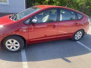 Red Toyota Prius 2008 in Panevezys, with an engine capacity of 1.50 L and mileage of 214 thousand km for 4200 €, photo 4 on AUTOMOTO.COM.LV