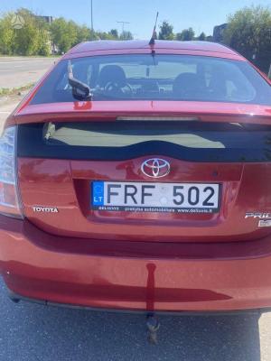 Red Toyota Prius 2008 in Panevezys, with an engine capacity of 1.50 L and mileage of 214 thousand km for 4200 €, photo 7 on AUTOMOTO.COM.LV