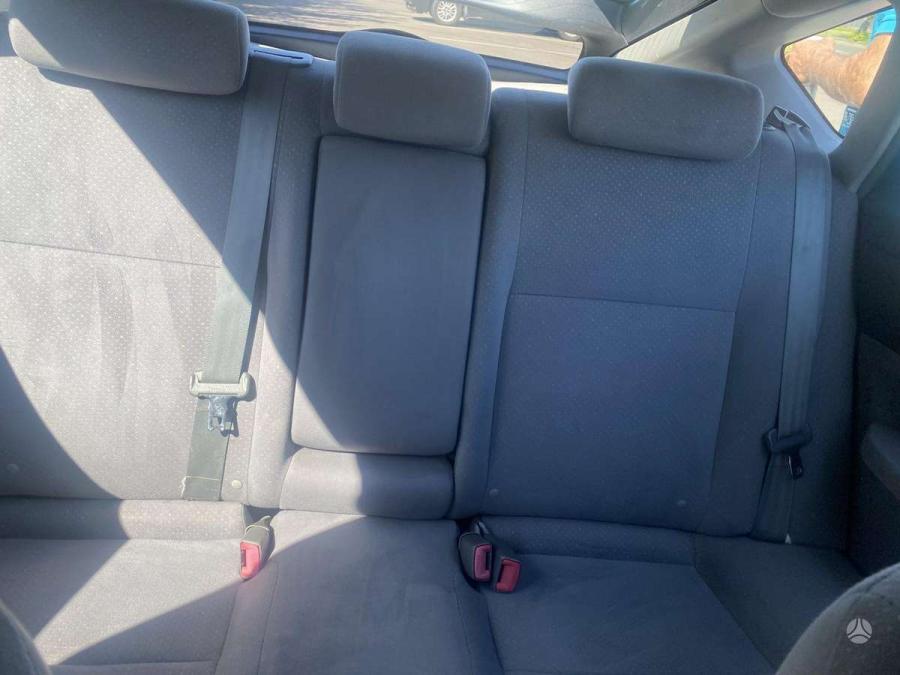 Red Toyota Prius 2008 in Panevezys, with an engine capacity of 1.50 L and mileage of 214 thousand km for 4200 €, photo 11 on AUTOMOTO.COM.LV