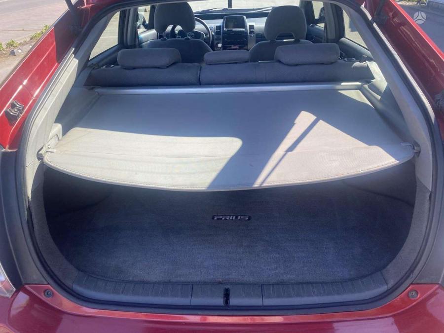 Red Toyota Prius 2008 in Panevezys, with an engine capacity of 1.50 L and mileage of 214 thousand km for 4200 €, photo 14 on AUTOMOTO.COM.LV