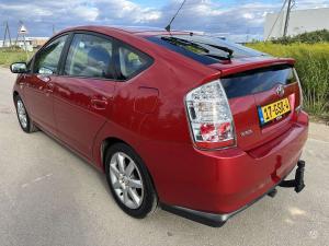 Red Toyota Prius 2008 in Kaunas, with an engine capacity of 1.50 L and mileage of 295 thousand km for 5400 €, photo 12 on AUTOMOTO.COM.LV