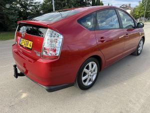 Red Toyota Prius 2008 in Kaunas, with an engine capacity of 1.50 L and mileage of 295 thousand km for 5400 €, photo 13 on AUTOMOTO.COM.LV
