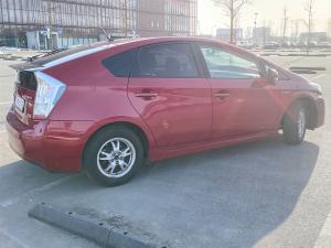 Red Toyota Prius 2011 in Klaipeda, with an engine capacity of 1.80 L and mileage of 411 thousand km for 3850 €, photo 7 on AUTOMOTO.COM.LV