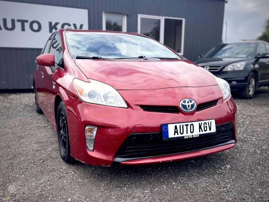 Red Toyota Prius 2012 in Vilnius, with an engine capacity of 1.80 L and mileage of 297 thousand km for 8899 €, photo 9 on AUTOMOTO.COM.LV