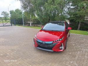 Red Toyota Prius 2018 in Kaunas, with an engine capacity of 1.80 L and mileage of 148 thousand km for 14850 €, photo 3 on AUTOMOTO.COM.LV