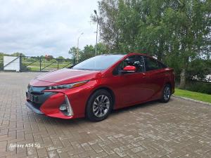 Red Toyota Prius 2018 in Kaunas, with an engine capacity of 1.80 L and mileage of 148 thousand km for 14850 €, photo 4 on AUTOMOTO.COM.LV