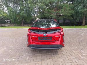 Red Toyota Prius 2018 in Kaunas, with an engine capacity of 1.80 L and mileage of 148 thousand km for 14850 €, photo 9 on AUTOMOTO.COM.LV