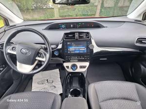 Red Toyota Prius 2018 in Kaunas, with an engine capacity of 1.80 L and mileage of 148 thousand km for 14850 €, photo 11 on AUTOMOTO.COM.LV
