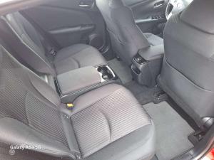 Red Toyota Prius 2018 in Kaunas, with an engine capacity of 1.80 L and mileage of 148 thousand km for 14850 €, photo 14 on AUTOMOTO.COM.LV