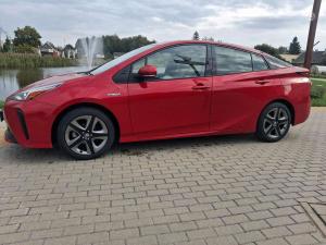 Red Toyota Prius 2019 in Raseiniai, with an engine capacity of 1.80 L and mileage of 185 thousand km for 14900 €, photo 15 on AUTOMOTO.COM.LV