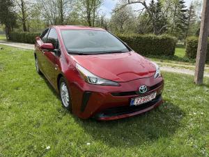 Red Toyota Prius 2021 in Panevezys, with an engine capacity of 1.80 L and mileage of 212 thousand km for 12400 €, photo 5 on AUTOMOTO.COM.LV