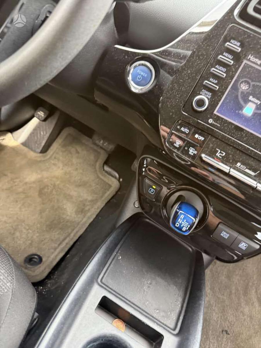 Red Toyota Prius 2021 in Panevezys, with an engine capacity of 1.80 L and mileage of 212 thousand km for 12400 €, photo 12 on AUTOMOTO.COM.LV