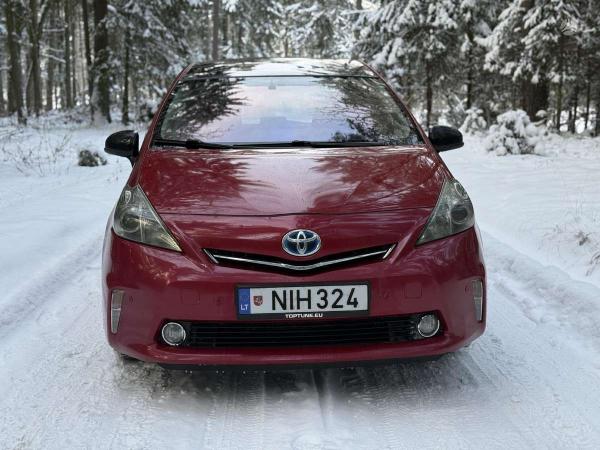 Red Toyota Prius 2012 in Kaunas, with an engine capacity of 1.80 L and mileage of 466 thousand km for 7550 €, photo 2 on AUTOMOTO.COM.LV