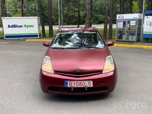 Red Toyota Prius 2004 in Riga, with an engine capacity of 1.50 L and mileage of 0 thousand km for 1199 €, photo 8 on AUTOMOTO.COM.LV