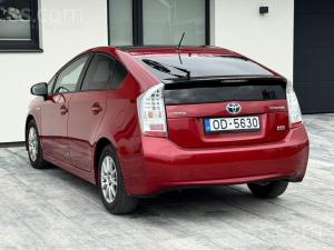 Red Toyota Prius 2012 in Jelgava, with an engine capacity of 1.80 L and mileage of 244 thousand km for 7800 €, photo 3 on AUTOMOTO.COM.LV