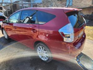 Red Toyota Prius 2013 in Siauliai, with an engine capacity of 1.80 L and mileage of 228 thousand km for 8500 €, photo 4 on AUTOMOTO.COM.LV