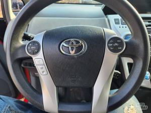 Red Toyota Prius 2013 in Siauliai, with an engine capacity of 1.80 L and mileage of 228 thousand km for 8500 €, photo 6 on AUTOMOTO.COM.LV