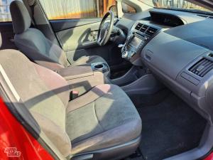 Red Toyota Prius 2013 in Siauliai, with an engine capacity of 1.80 L and mileage of 228 thousand km for 8500 €, photo 8 on AUTOMOTO.COM.LV