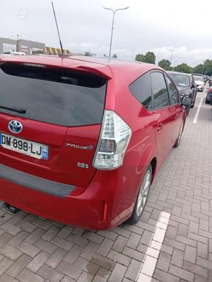 Красный Тойота Приус 2014 в Таураге, объемом двигателя 1.80 л и пробегом 243 тыс. км за 9200 €, фото 6 на AUTOMOTO.COM.LV